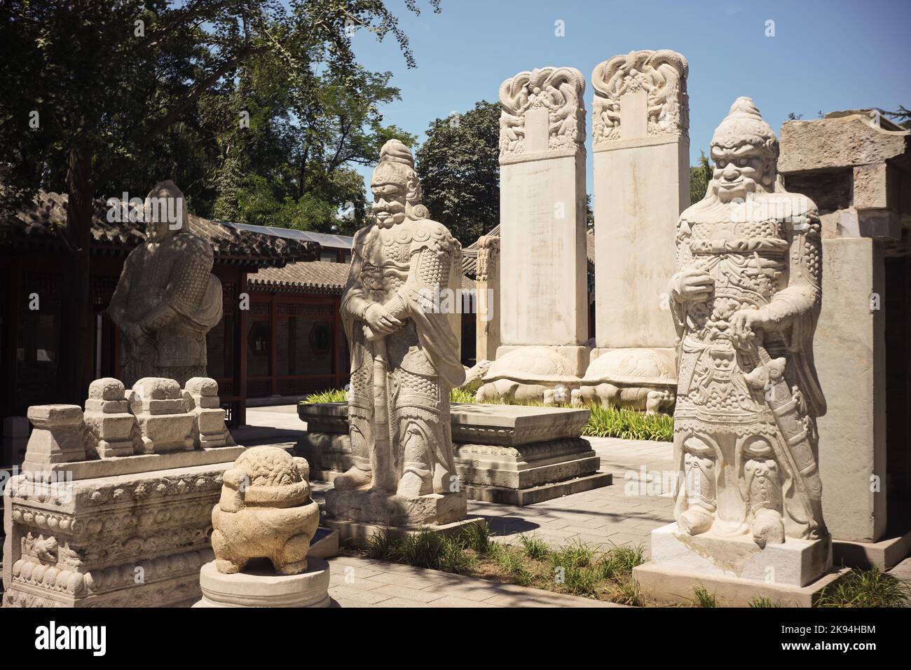 A carved stone artwork funerary monuments in green gardens of Zhenjue ...