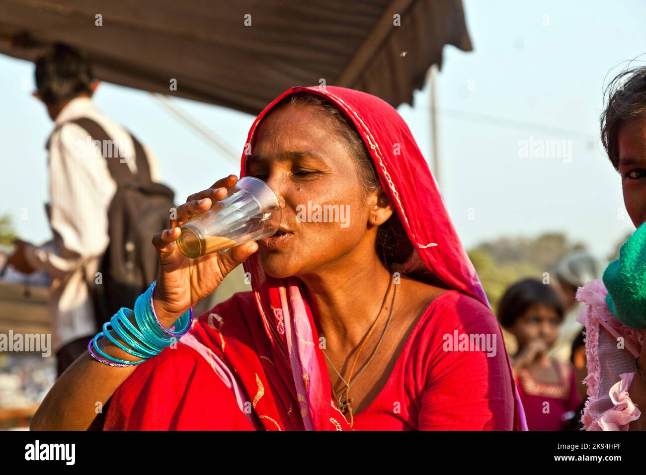 Indian woman in sari drinking hi-res stock photography and images - Alamy