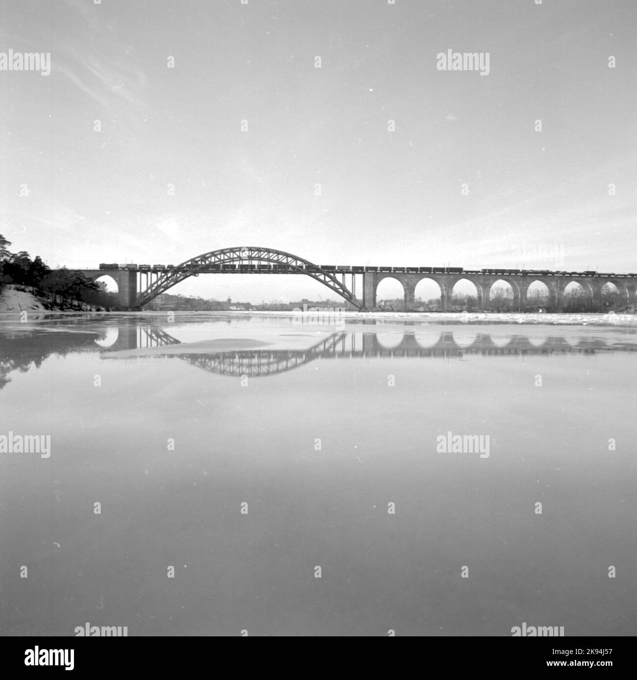 Freight trains pass the bridge Stock Photo - Alamy
