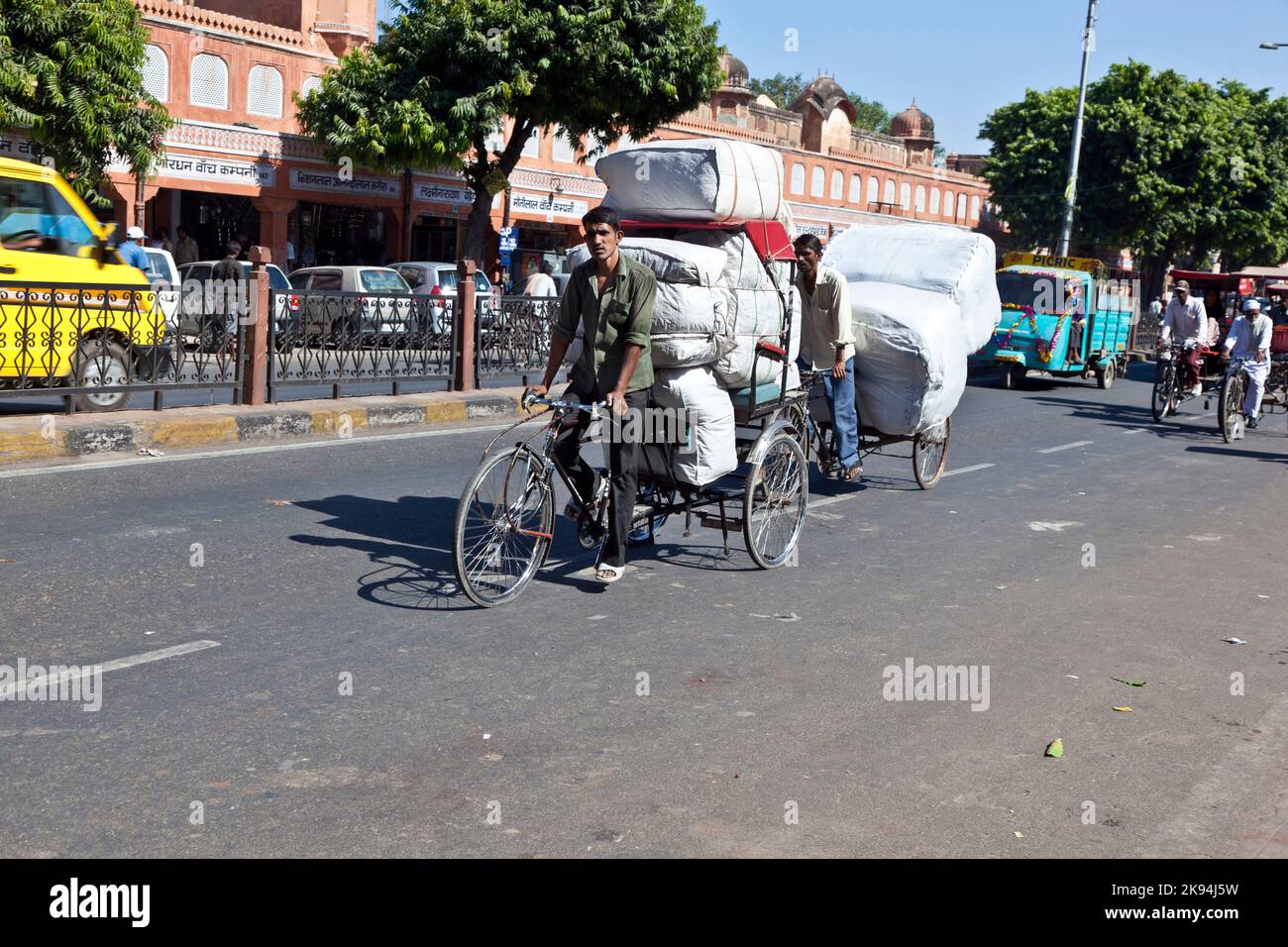 JAIPUR, INDIA - NOVEMBER 12: Cycle rickshaws with cargo load in the ...