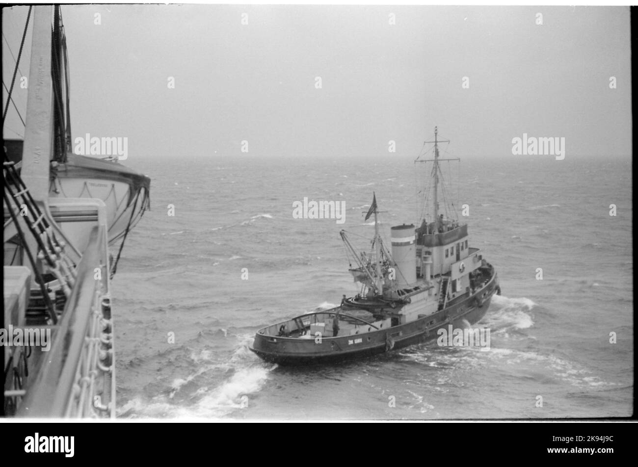 Pilot boat by ship Stock Photo - Alamy