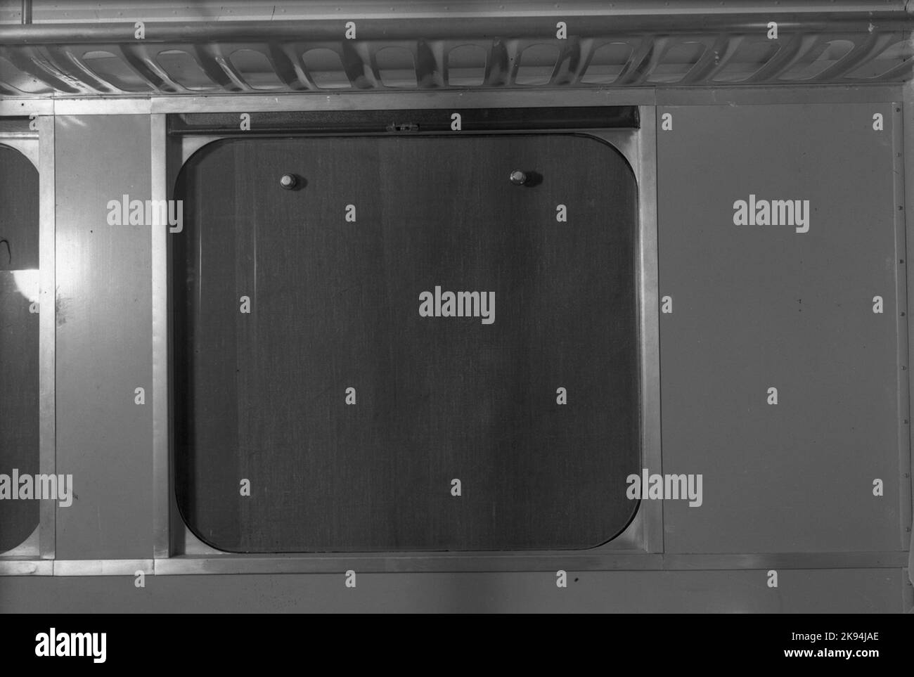 Part of wall with windows in subway carriage atrack Stock Photo - Alamy