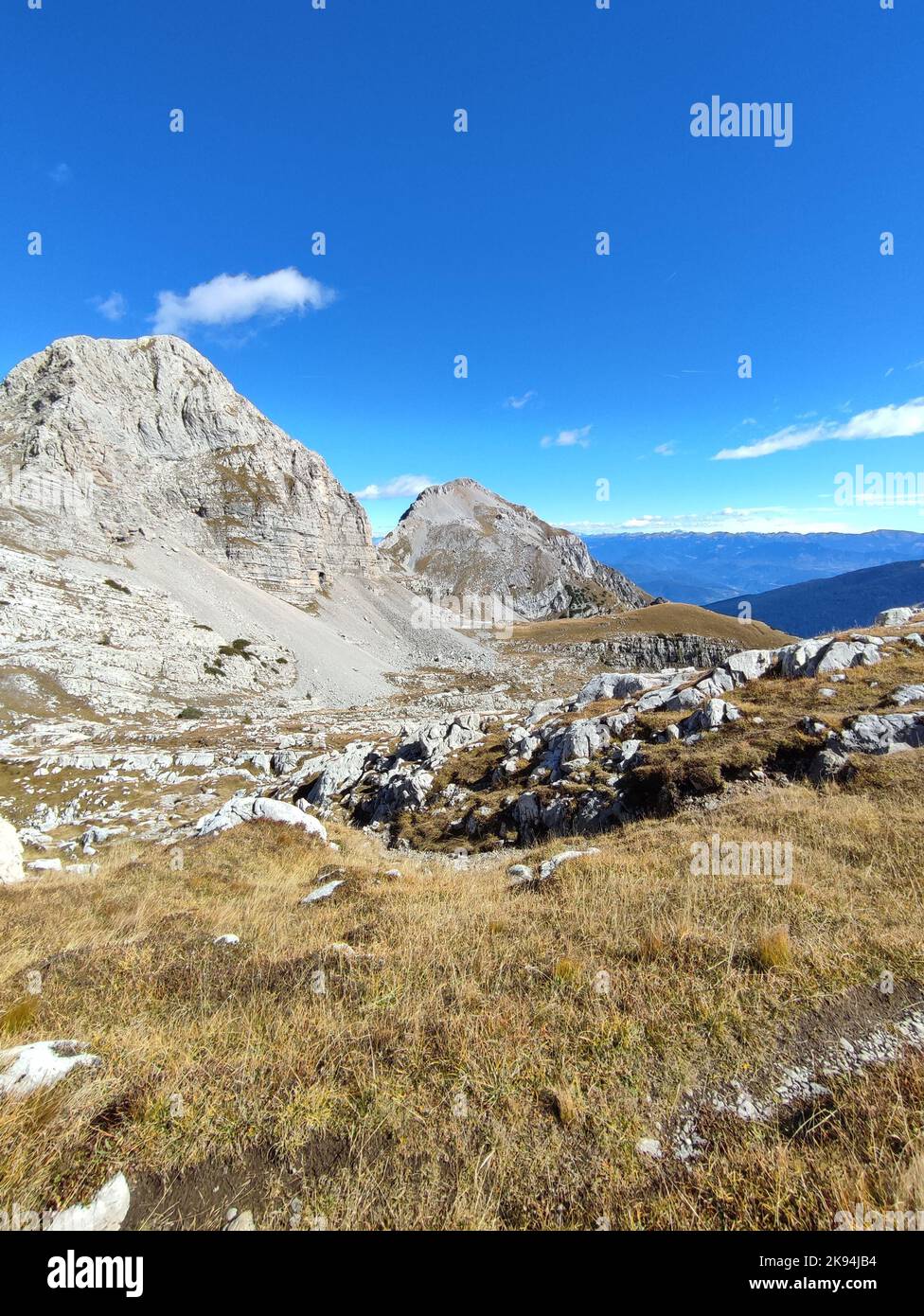 A deserted rocky landscape under clear blue sky Stock Photo - Alamy