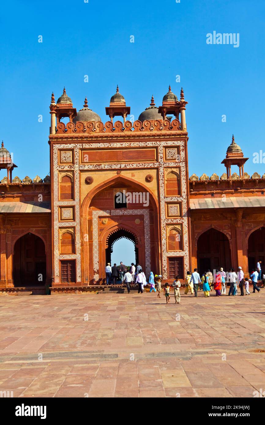 FATEPHUR SIKRI, INDIA - NOVEMBER 17: Pilgrims visit the Jama Masjid ...