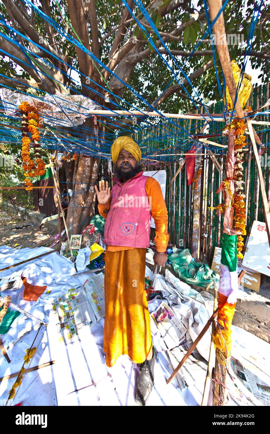 DELHI, INDIA - NOVEMBER 18: a sikh priest is protesting for his rights ...