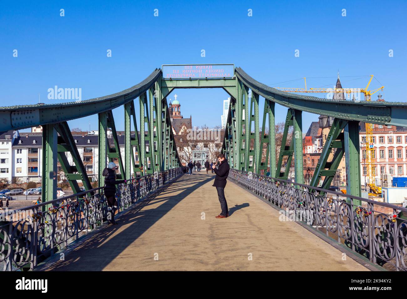 FRANKFURT, GERMANY - FEBRUARY 2: people enjoy crossing river Main at ...