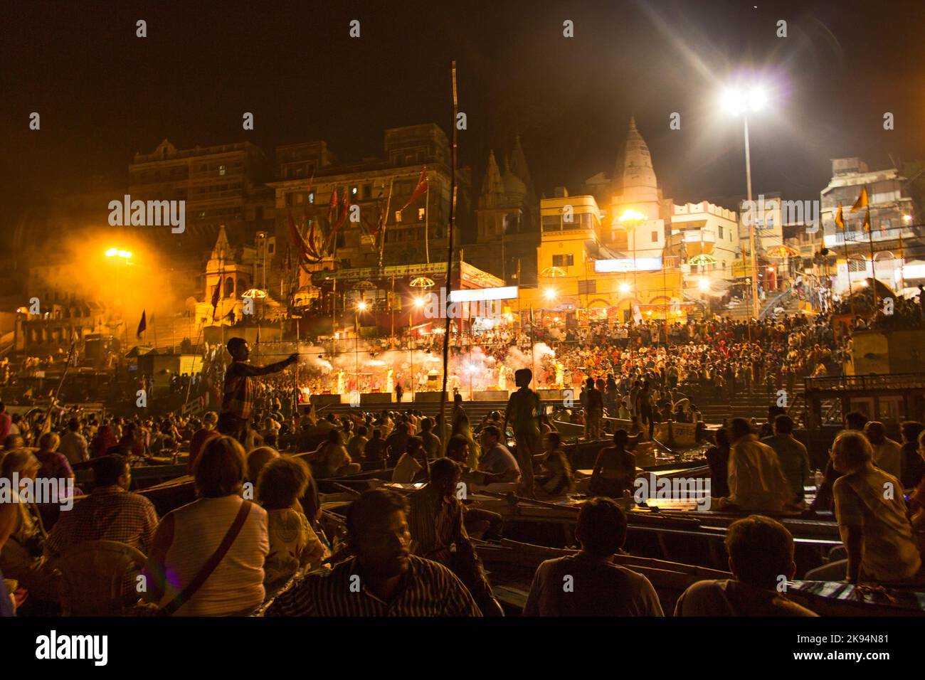VARANASI, INDIA- MAY 4: Crowds of people worshiping bathing in the ...