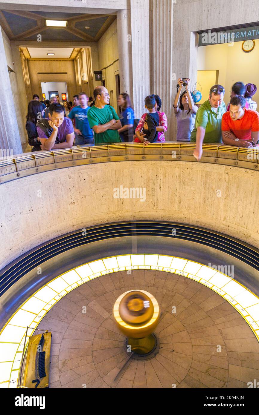 LOS ANGELES, CA - JUNE 10: people admire the Foucault pendulum in ...