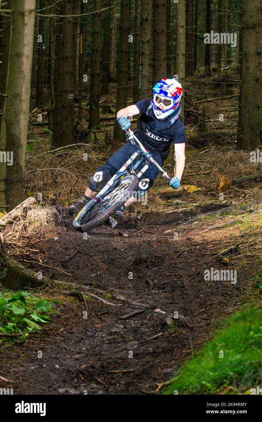 KRONBERG, GERMANY - JULY 7: downhill biker jumps over a ramp in the ...