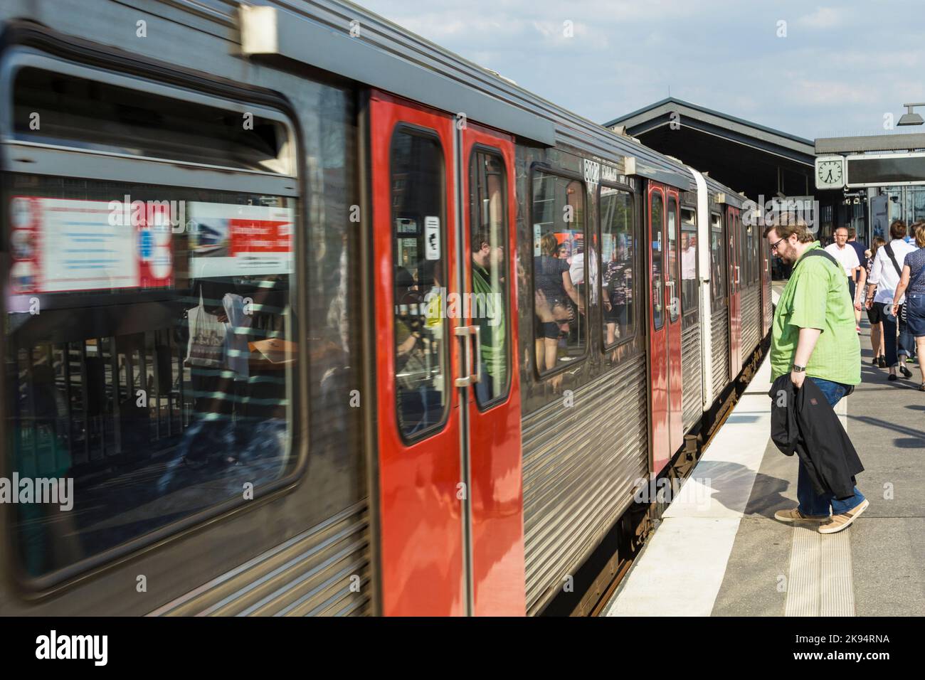 Hamburg, Germany - July 25, 2012: people enter the train at Baumwall U ...