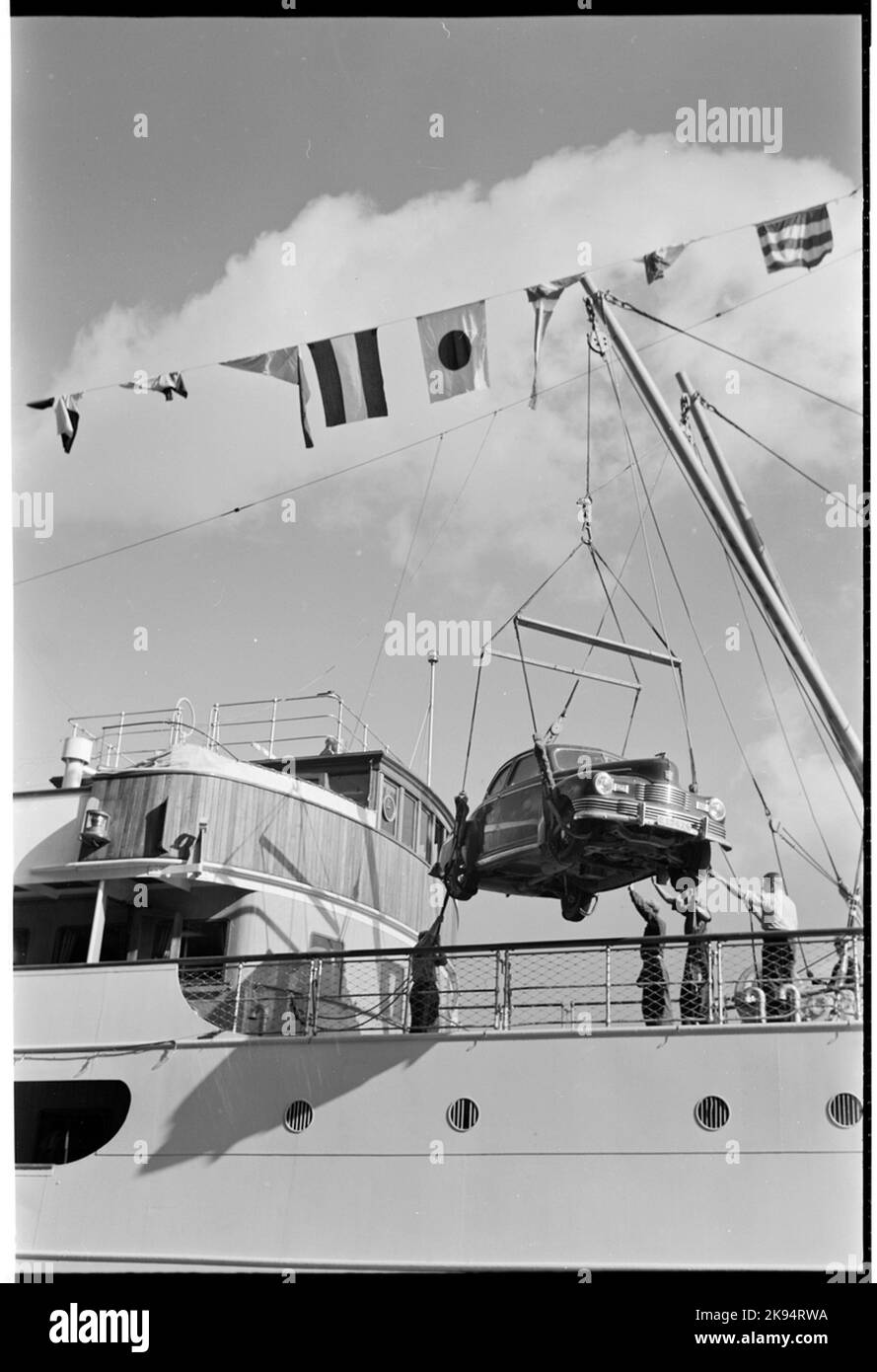 A car is loaded on board ships Stock Photo - Alamy