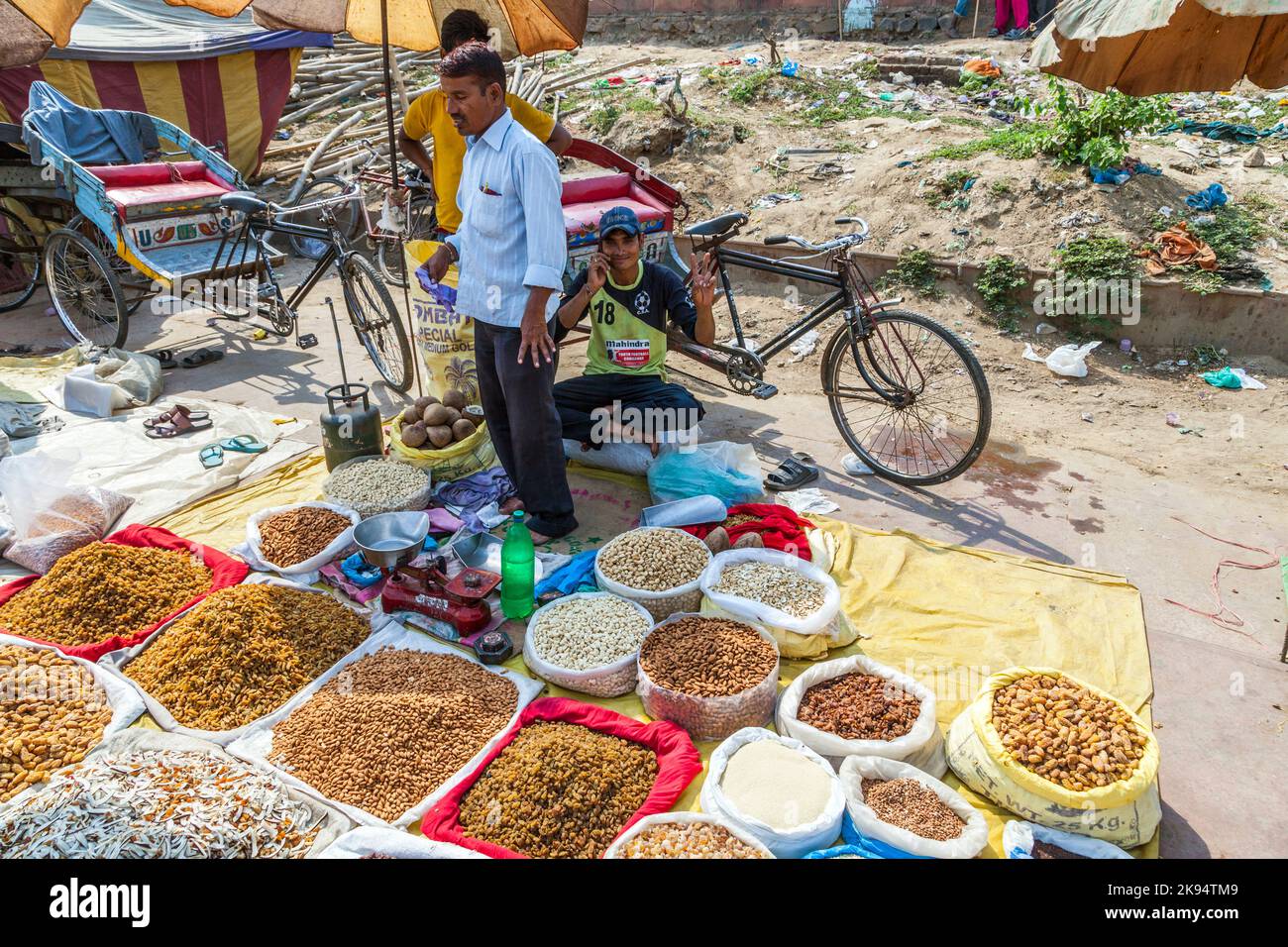 DELHI, INDIA - OCT 15: Indian people buy raisins at the Jama Mashid ...