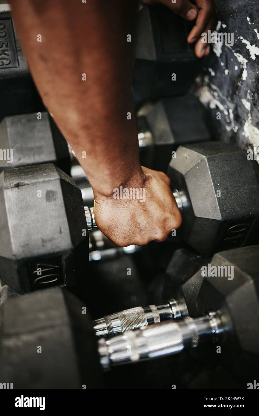 Dumbbell, man hands and weight training in gym, fitness club or ...
