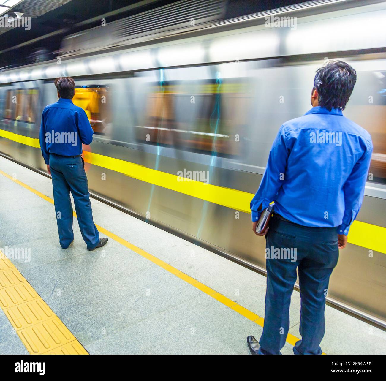 DELHI, INDIA - OCTOBER 16: passengers alighting metro train on October ...
