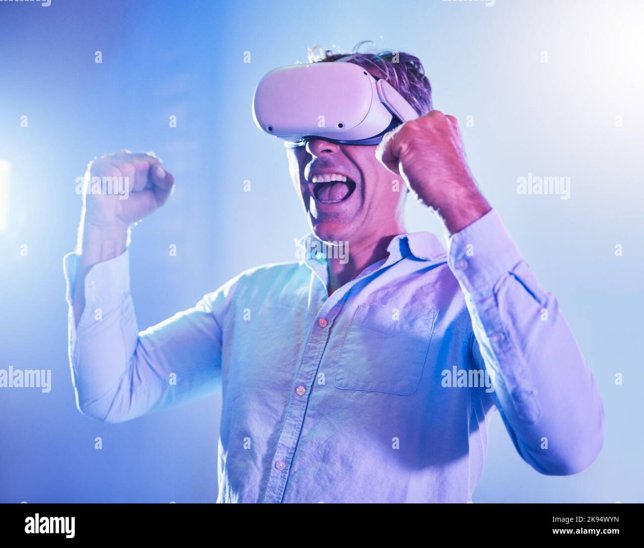 Winner, senior and man with virtual reality glasses celebrating game ...