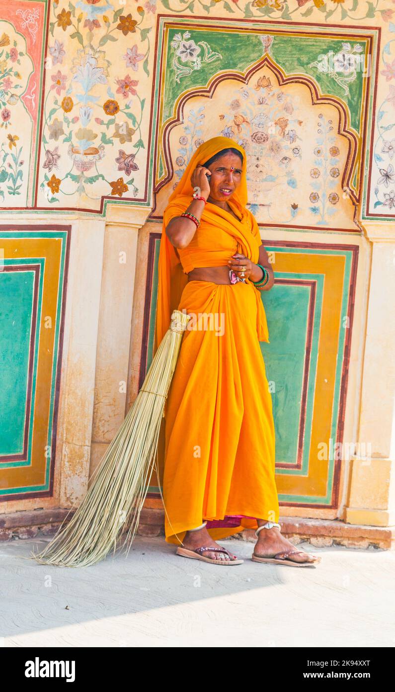 AMER, INDIA - 19 NOVEMBER: woman of fourt class in brightly colored ...