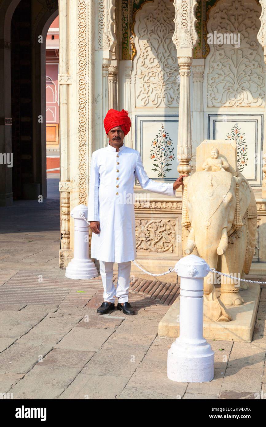 JAIPUR, INDIA - OCT 19: Indian guard with red turban in the City Palace ...