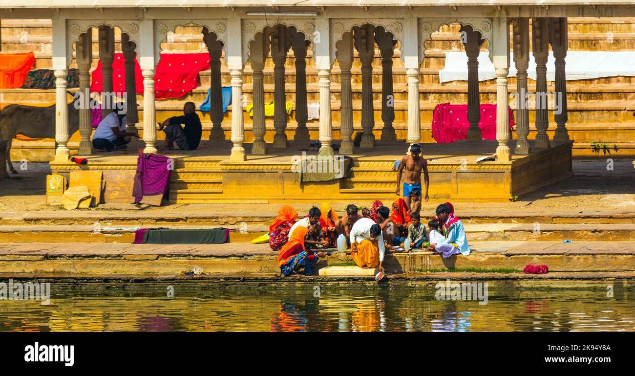 PUSHKAR, INDIA - OCT 20: people at rituell washing in the holy lake on ...