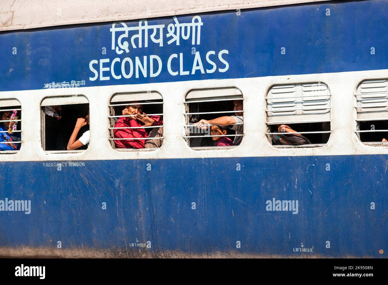 JAIPUR, INDIA - OCT 23, 2012: Unidentified passengers hanging at the ...