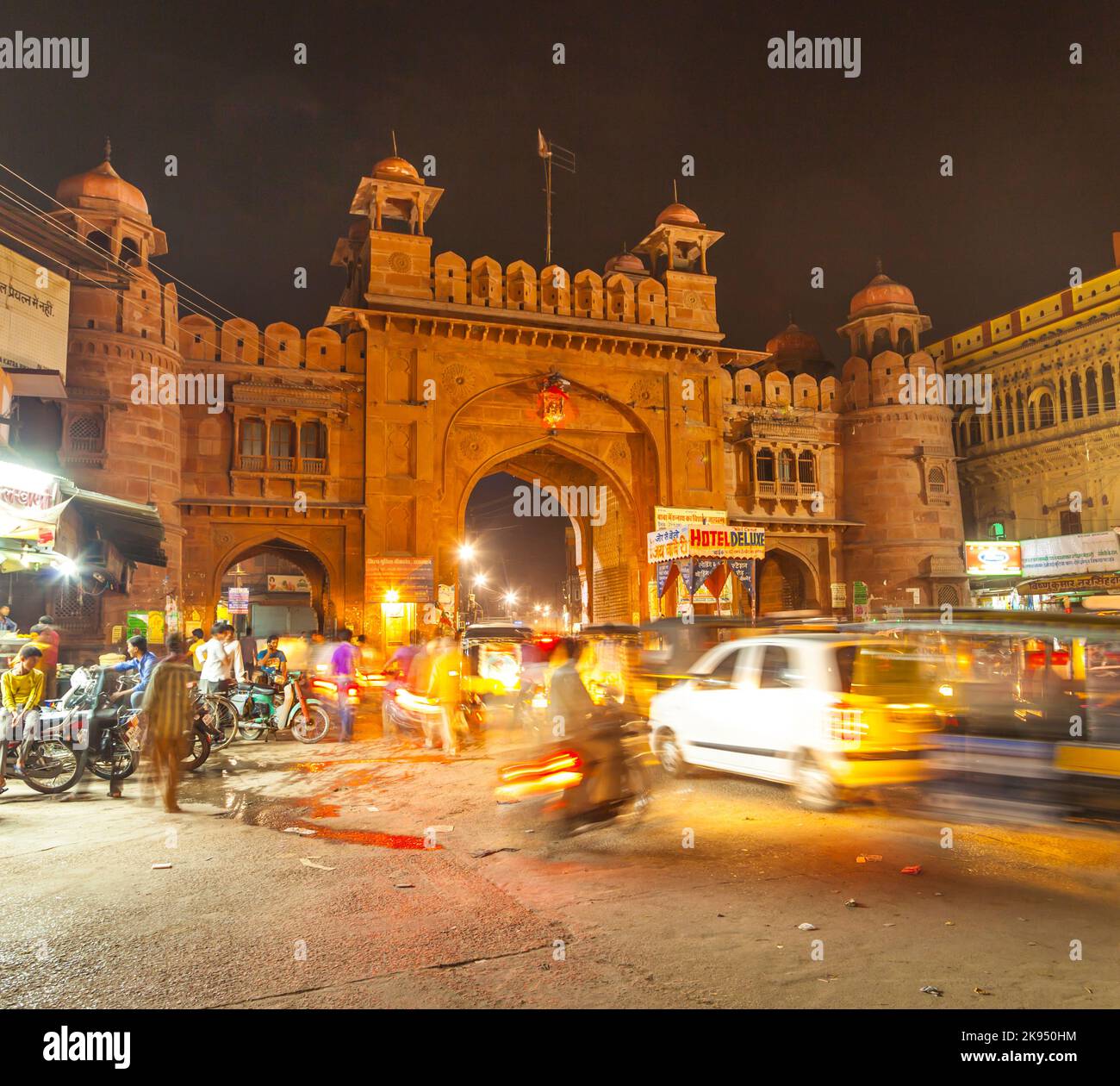 BIKANER, INDIA - OCT 23: people pass the ancient gate by night on ...