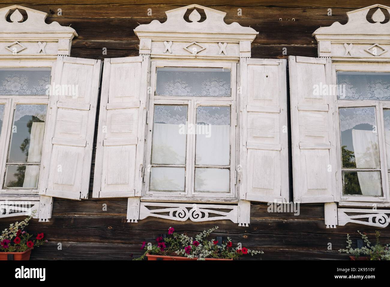 a simple white window with shutters in a country house Stock Photo - Alamy