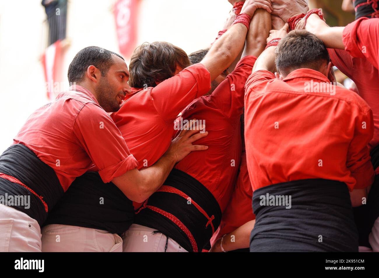 Castell (castle / human tower) 3 de 9 of the Colla Jove dels Xiquets de ...