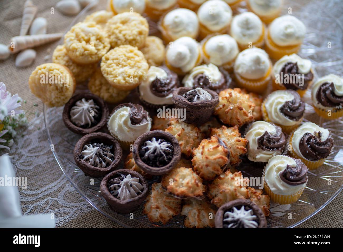 The mini sweets on the table with decorations Stock Photo - Alamy