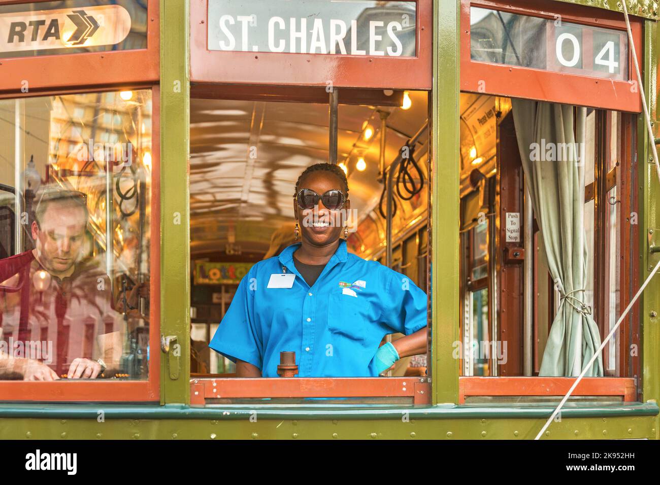 NEW ORLEANS - JULY 17: friendly conductor in the famous old Street car ...