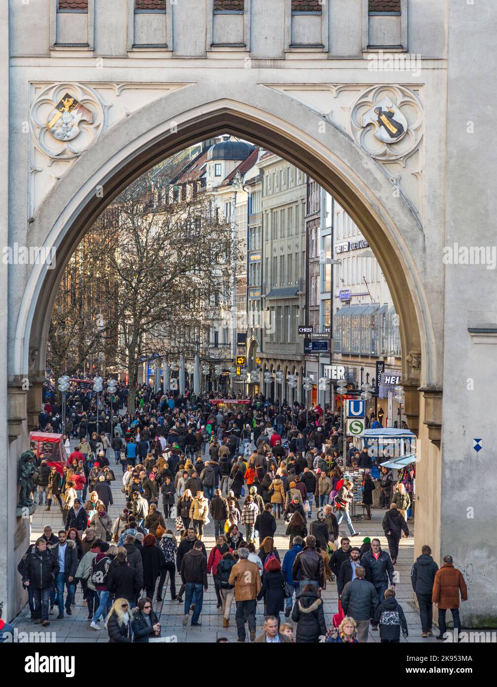 MUNICH, GERMANY - DEC 27: people pass the Karlstor at Stachus on Dec 27 ...