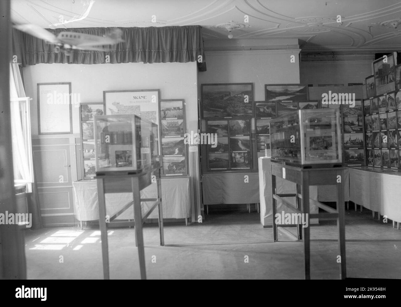 Rooms with display items exp. booth by train Stock Photo - Alamy