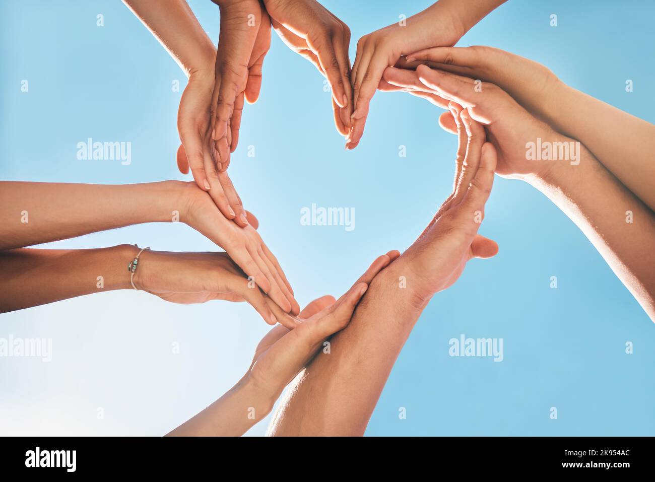 Heart, love and group hands for support, care and community with ...