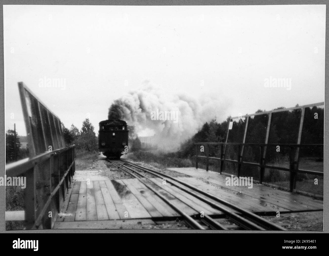 The back steam locomotive passes the viaduct over the east coast of the ...