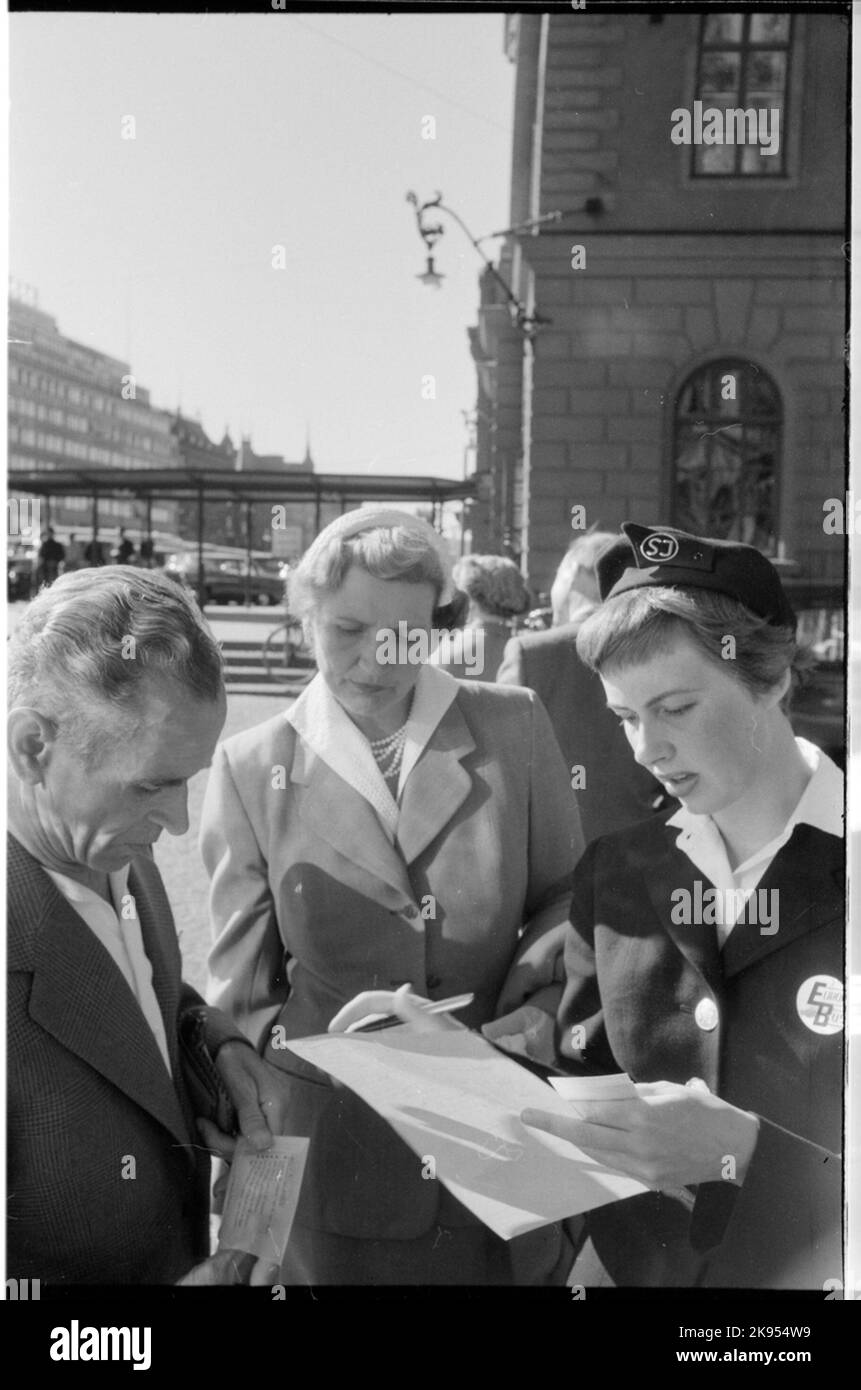 Bus hostess dots by travelers Stock Photo - Alamy