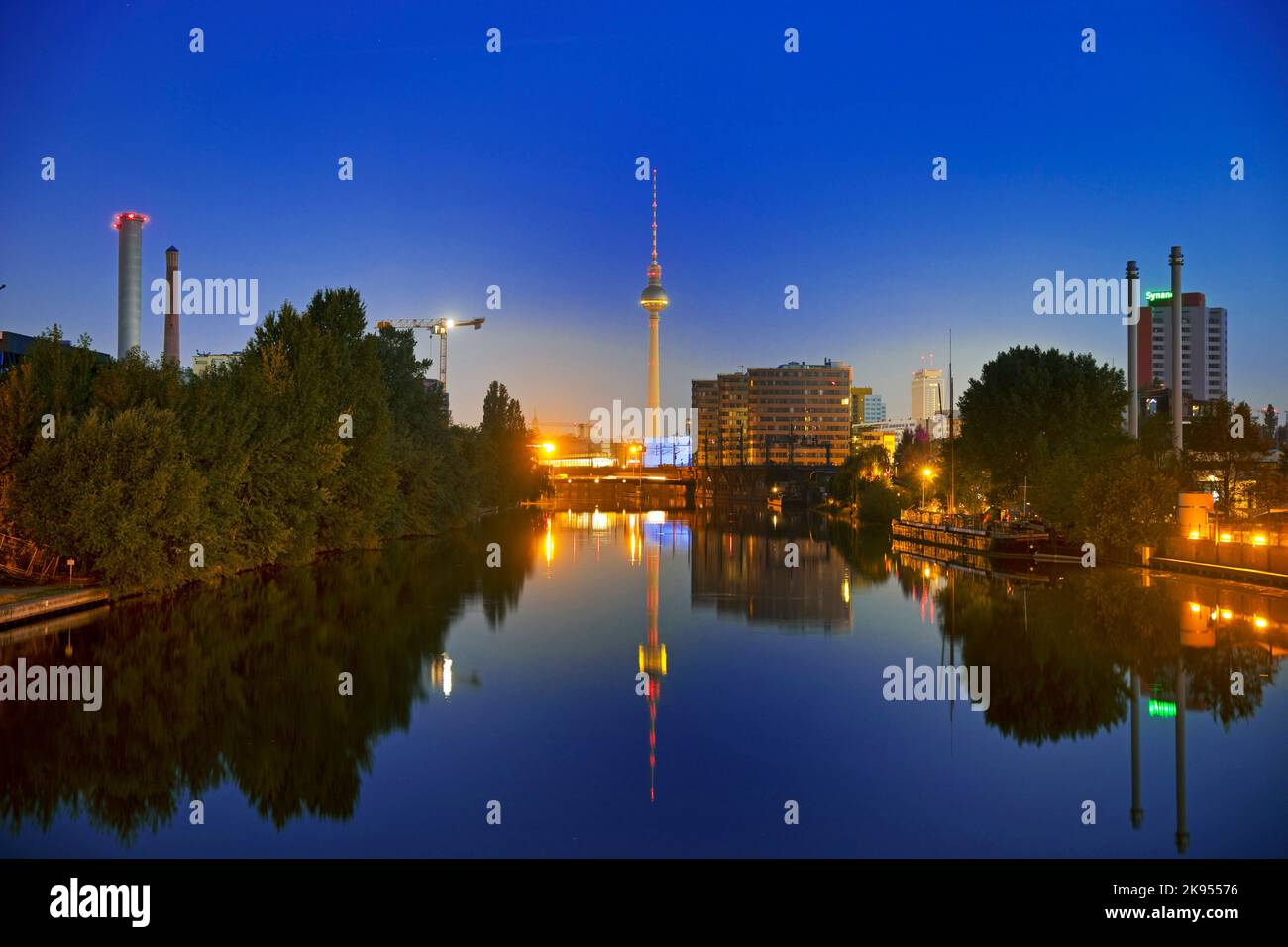 Spree with television tower seen from Schilling Bridge at twilight ...