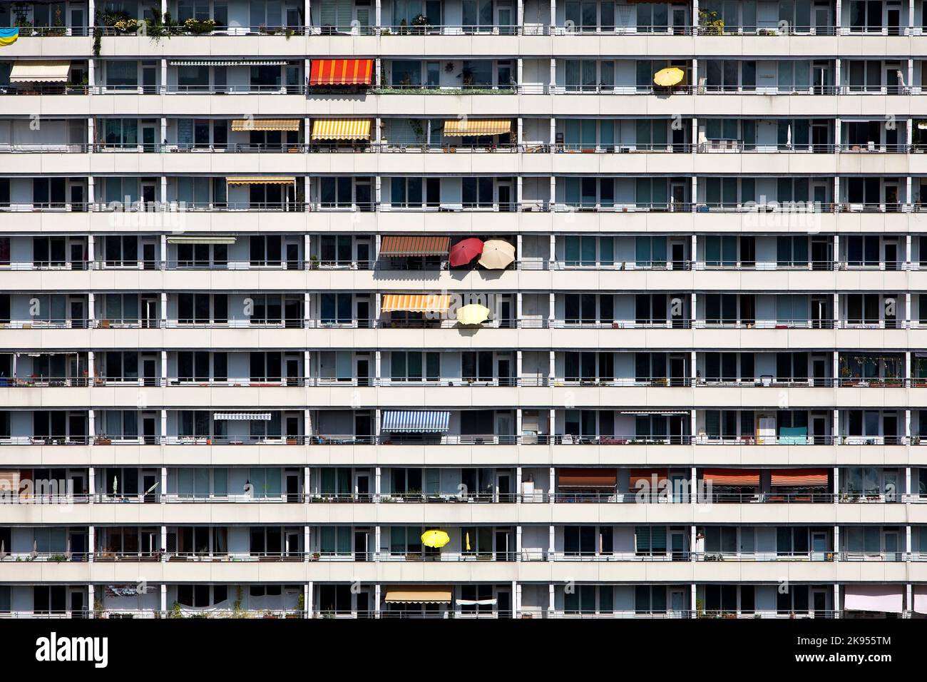 facade with many balconies from a high-rise building, plattenbau ...
