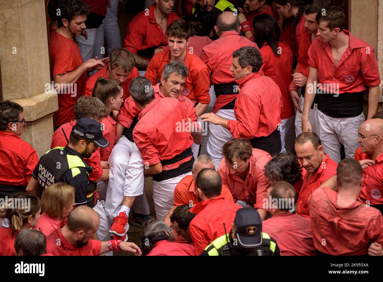 Fall of a Castell (human tower) "5 of 9" of the Colla Jove dels Xiquets ...