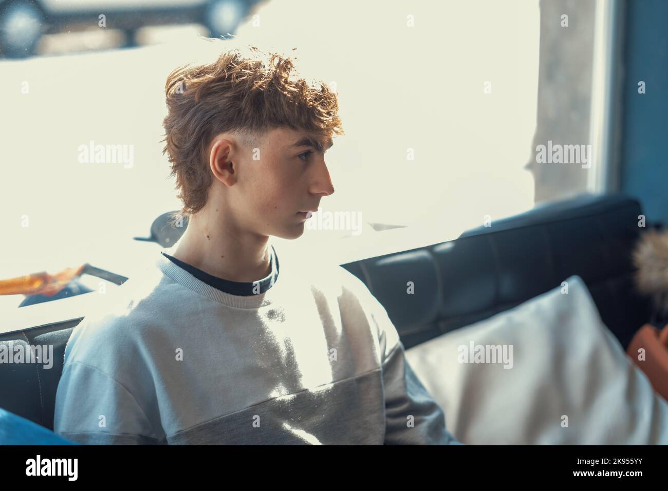 A portrait of a young Caucasian boy with a fresh mullet haircut Stock ...