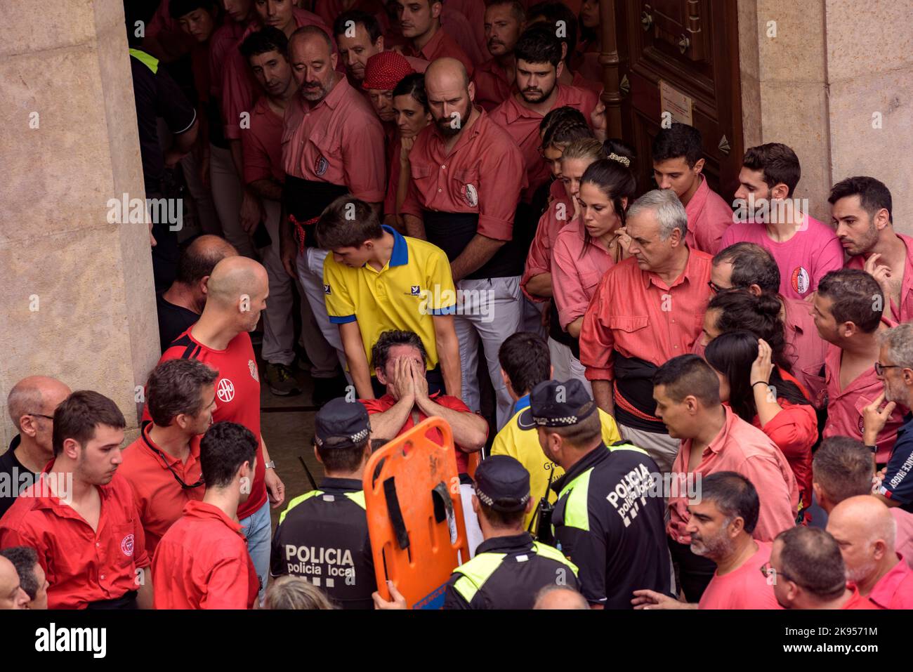 Fall of a Castell (human tower) "5 of 9" of the Colla Jove dels Xiquets ...