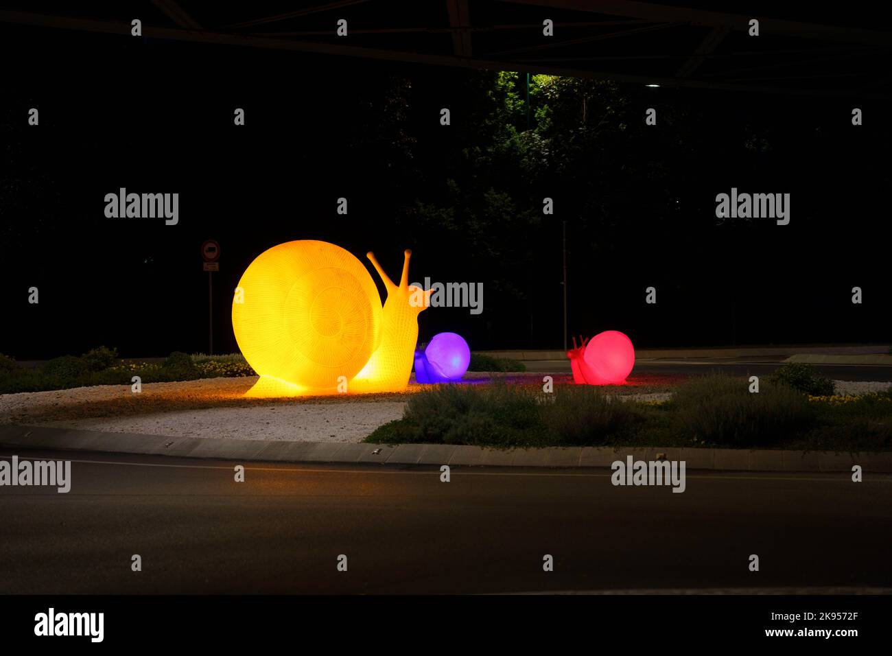 Statues of snails at a roundabout in Mestre, Venice, Italy, by night ...