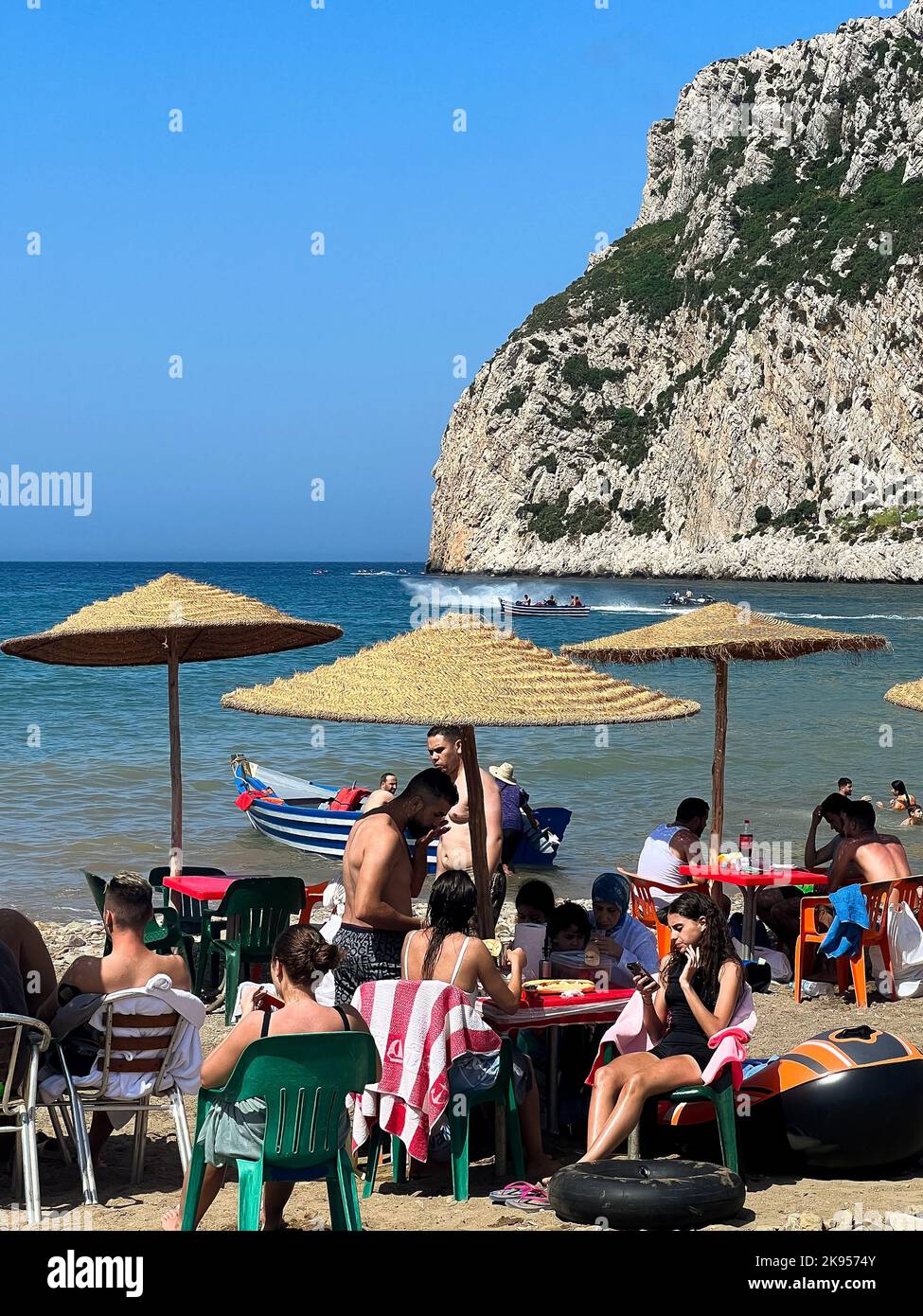 People enjoying their summer holiday on the beach Stock Photo - Alamy