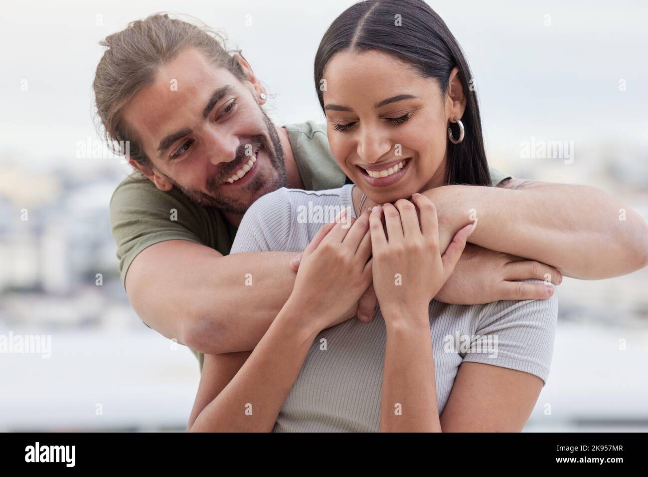 Care, interracial and hug for love in couple relationship with happy ...