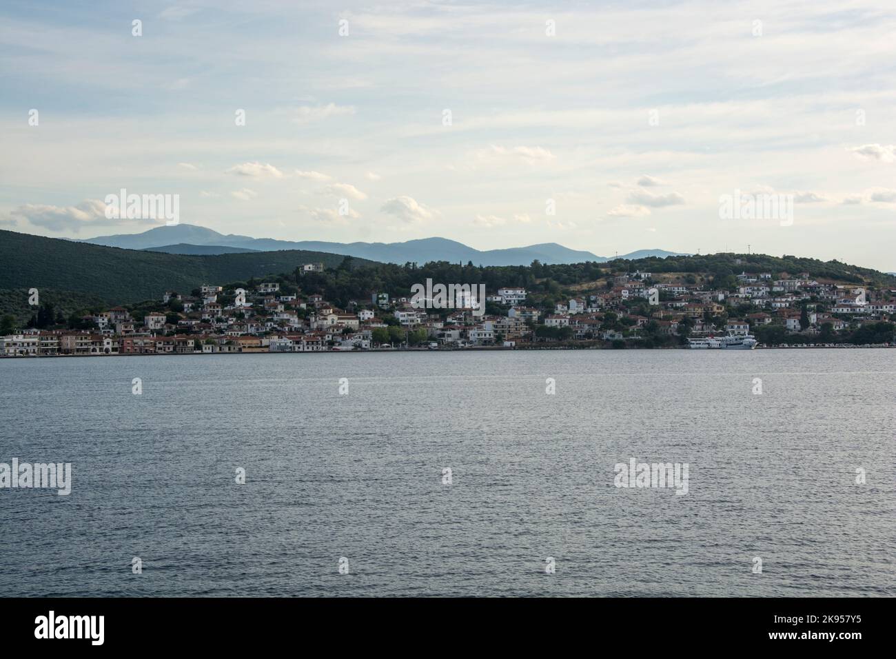 An aerial view of a sea with buildings in the background in Amaliapoli ...