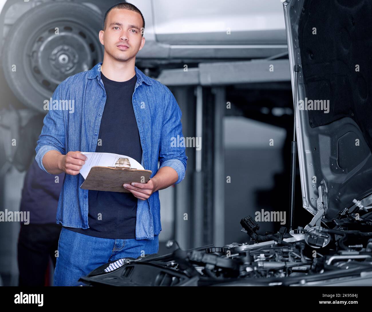 Engineer, mechanic and car engine manager with checklist working on ...