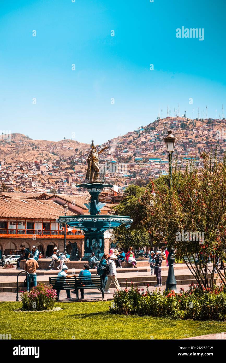 The Main Square with a fountain and cityscape of Cusco, Peru, vertical ...