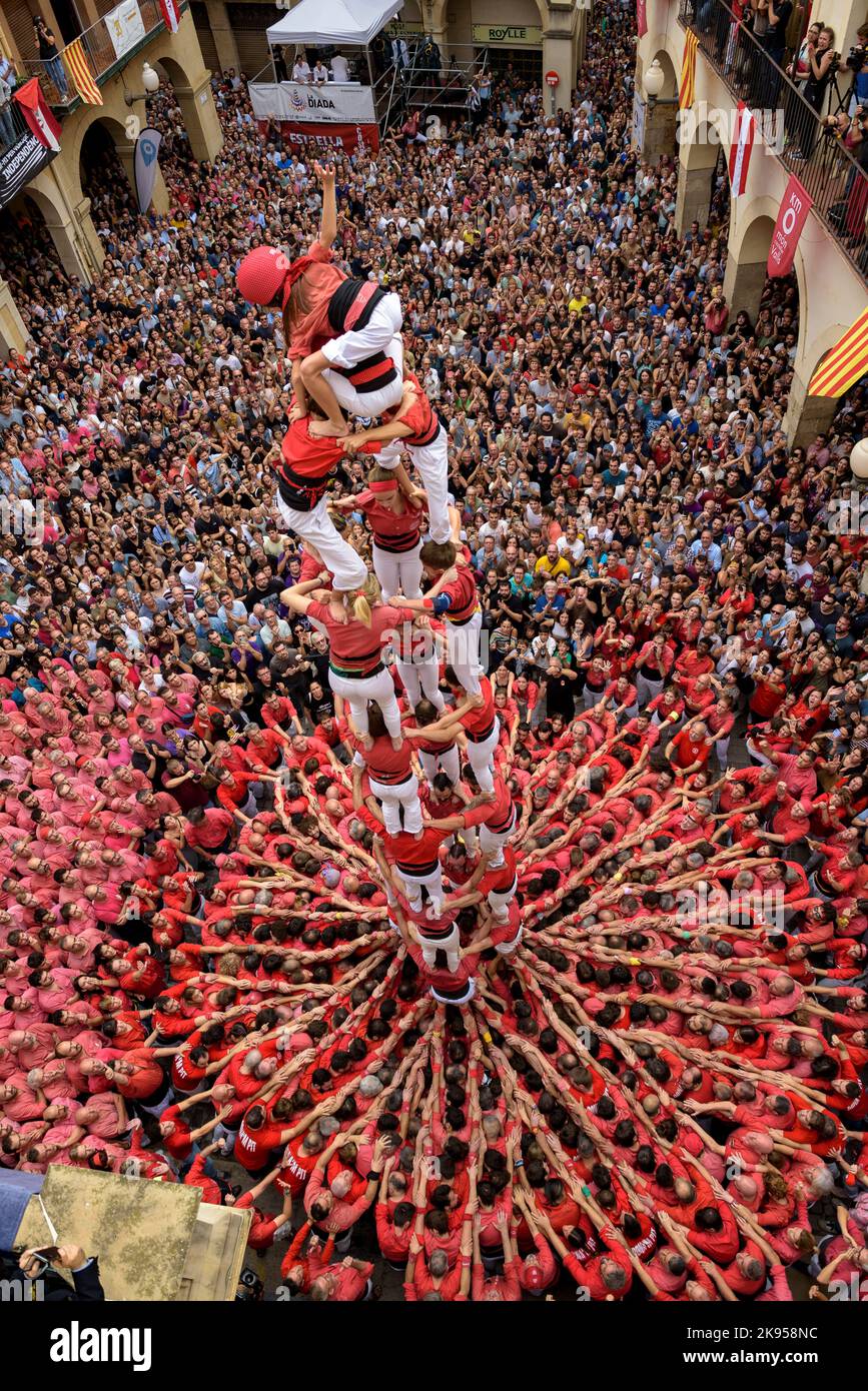 Castell (castle/human tower) of 9 floors loaded in the Diada castellera ...