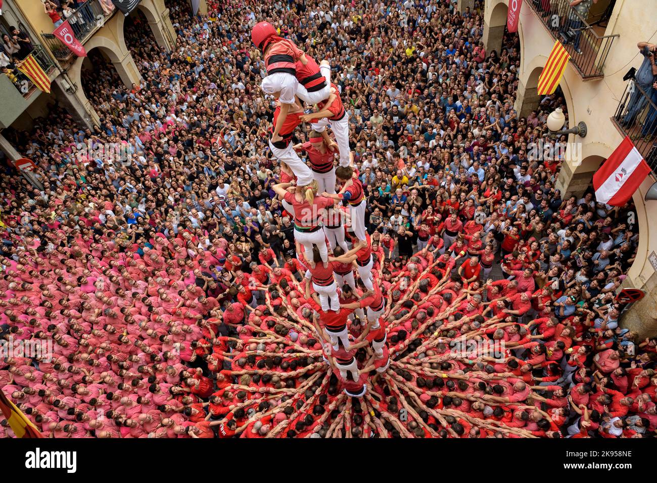 Castell (castle/human tower) of 9 floors loaded in the Diada castellera ...