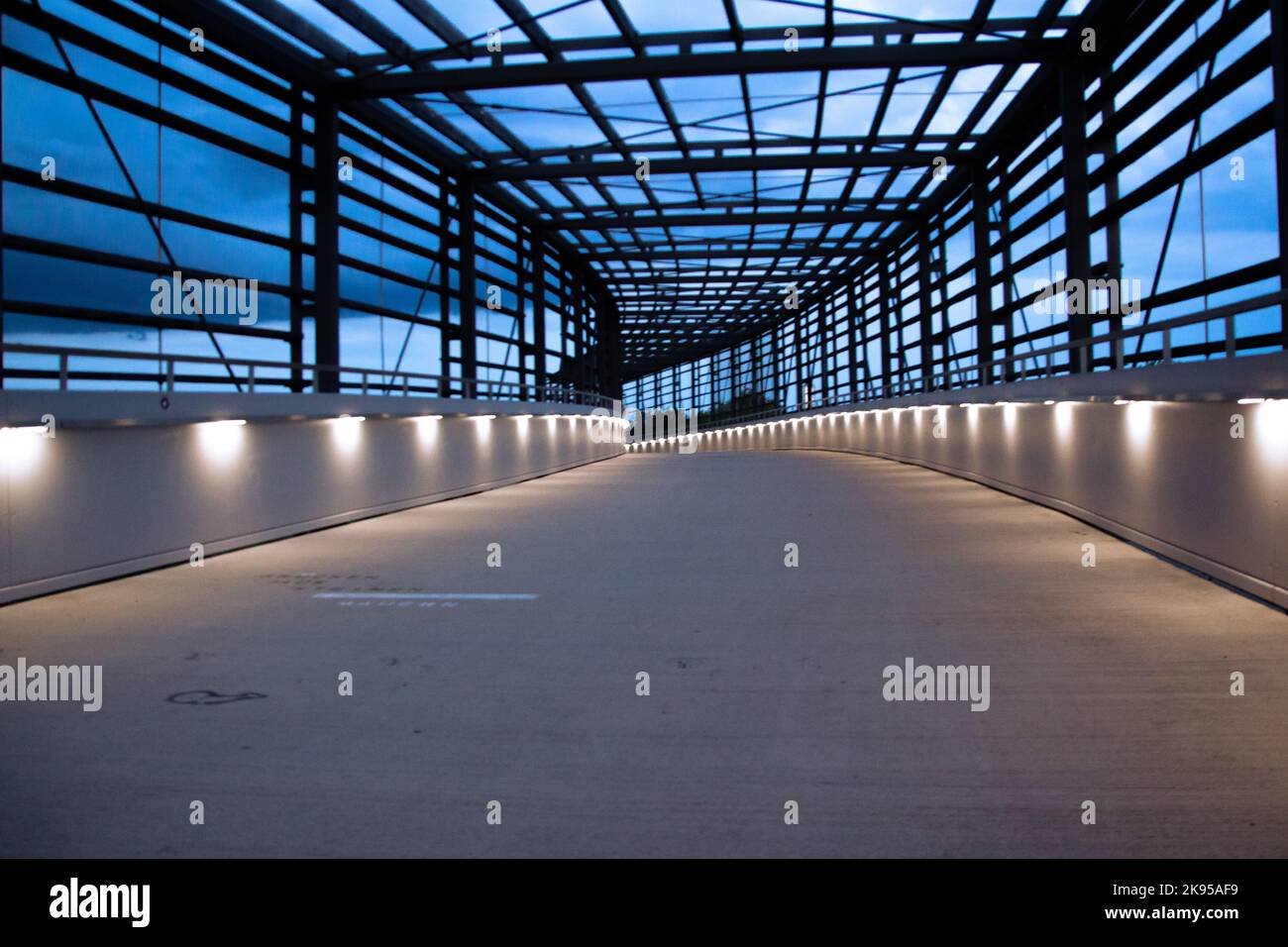 An illuminated pedestrian bridge in Landau, Germany Stock Photo - Alamy