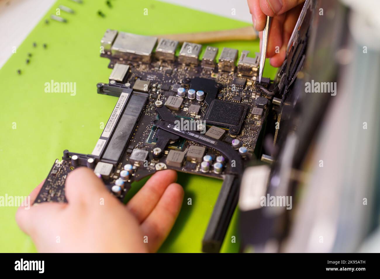 Professional computer and tablet repair shop or service. Close up of a ...