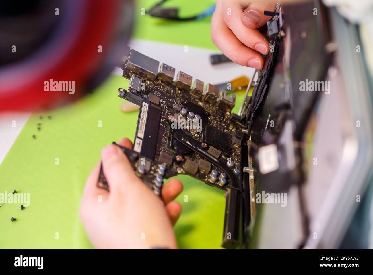 Professional computer and tablet repair shop or service. Close up of a ...