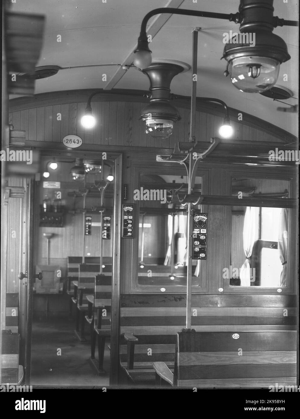 Gas lighting and electrical lighting in passenger car Stock Photo - Alamy